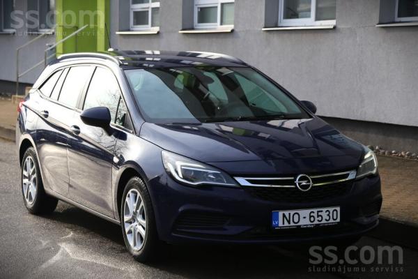 Blue Opel Astra 2017 in Riga, with an engine capacity of 1.60 L and mileage of 259 thousand km for 5795 €, photo 4 on AUTOMOTO.COM.LV
