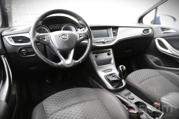 Blue Opel Astra 2017 in Riga, with an engine capacity of 1.60 L and mileage of 259 thousand km for 5795 €, photo 8 on AUTOMOTO.COM.LV