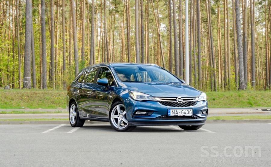 Blue Opel Astra 2017 in Riga, with an engine capacity of 1.60 L and mileage of 288 thousand km for 5690 €, photo 3 on AUTOMOTO.COM.LV