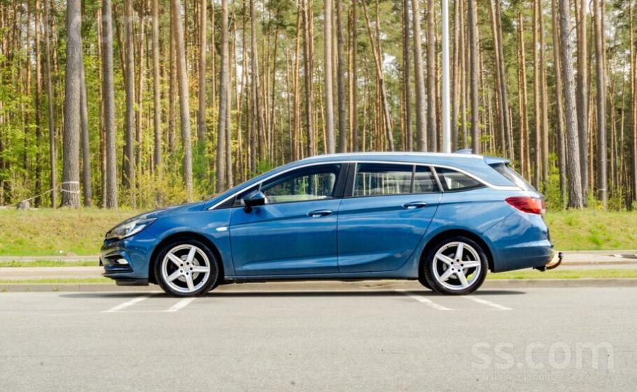 Blue Opel Astra 2017 in Riga, with an engine capacity of 1.60 L and mileage of 288 thousand km for 5690 €, photo 5 on AUTOMOTO.COM.LV