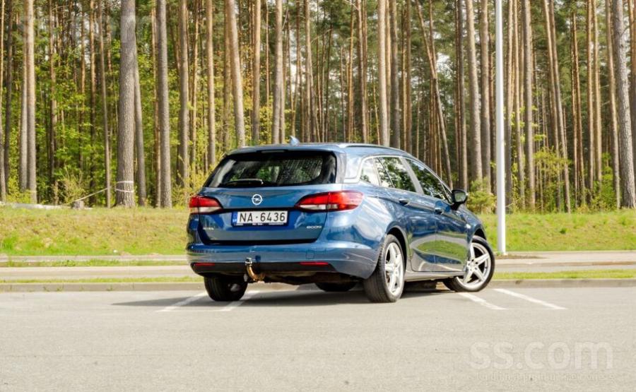 Blue Opel Astra 2017 in Riga, with an engine capacity of 1.60 L and mileage of 288 thousand km for 5690 €, photo 6 on AUTOMOTO.COM.LV