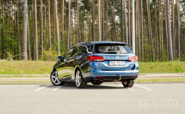 Blue Opel Astra 2017 in Riga, with an engine capacity of 1.60 L and mileage of 288 thousand km for 5690 €, photo 7 on AUTOMOTO.COM.LV