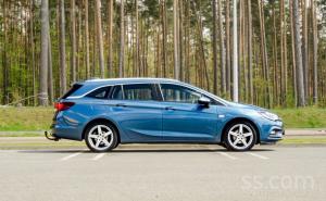 Blue Opel Astra 2017 in Riga, with an engine capacity of 1.60 L and mileage of 288 thousand km for 5690 €, photo 9 on AUTOMOTO.COM.LV