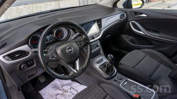 Blue Opel Astra 2017 in Riga, with an engine capacity of 1.60 L and mileage of 288 thousand km for 5690 €, photo 9 on AUTOMOTO.COM.LV