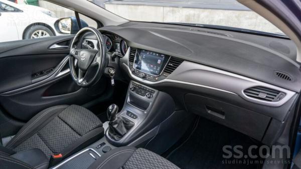 Blue Opel Astra 2017 in Riga, with an engine capacity of 1.60 L and mileage of 288 thousand km for 5690 €, photo 10 on AUTOMOTO.COM.LV