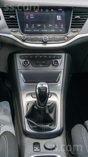 Blue Opel Astra 2017 in Riga, with an engine capacity of 1.60 L and mileage of 288 thousand km for 5690 €, photo 13 on AUTOMOTO.COM.LV