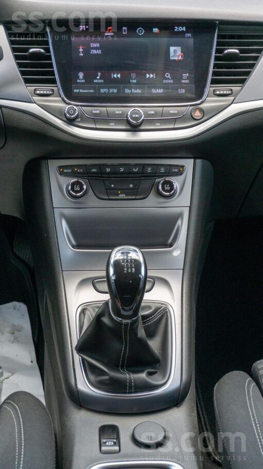 Blue Opel Astra 2017 in Riga, with an engine capacity of 1.60 L and mileage of 288 thousand km for 5690 €, photo 13 on AUTOMOTO.COM.LV
