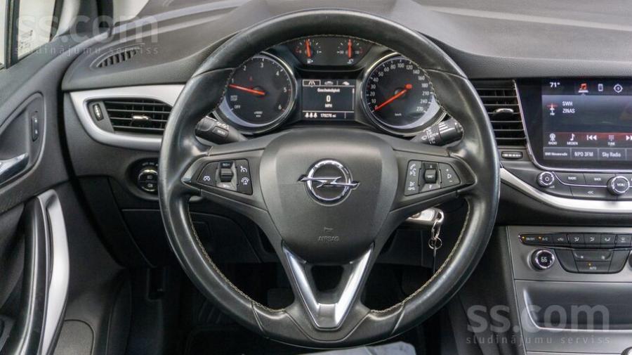 Blue Opel Astra 2017 in Riga, with an engine capacity of 1.60 L and mileage of 288 thousand km for 5690 €, photo 14 on AUTOMOTO.COM.LV