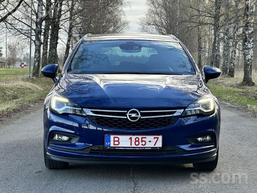 Blue Opel Astra 2018 in Tukums, with an engine capacity of 1.60 L and mileage of 225 thousand km for 6390 €, photo 3 on AUTOMOTO.COM.LV