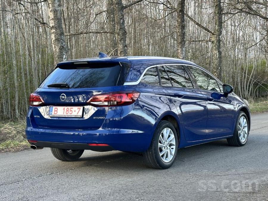 Blue Opel Astra 2018 in Tukums, with an engine capacity of 1.60 L and mileage of 225 thousand km for 6390 €, photo 7 on AUTOMOTO.COM.LV