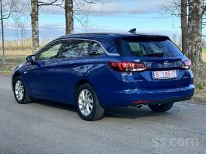 Blue Opel Astra 2018 in Tukums, with an engine capacity of 1.60 L and mileage of 225 thousand km for 6390 €, photo 9 on AUTOMOTO.COM.LV