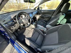 Blue Opel Astra 2018 in Tukums, with an engine capacity of 1.60 L and mileage of 225 thousand km for 6390 €, photo 10 on AUTOMOTO.COM.LV