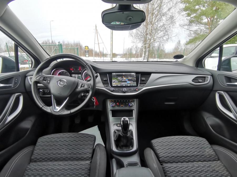Blue Opel Astra 2018 in Riga, with an engine capacity of 1.60 L and mileage of 147 thousand km for 8100 €, photo 6 on AUTOMOTO.COM.LV