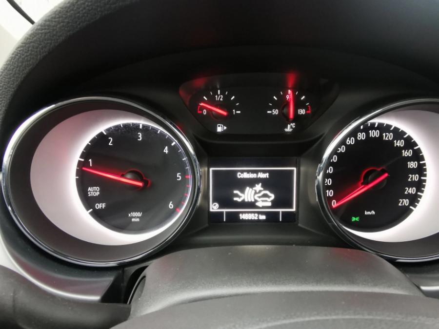 Blue Opel Astra 2018 in Riga, with an engine capacity of 1.60 L and mileage of 147 thousand km for 8100 €, photo 16 on AUTOMOTO.COM.LV