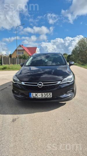Zils Opel Astra 2018 Rīga, ar dzinēja tilpumu 1.60 L un nobraukumu 158 tūkst. km par 9800 €, foto  vietnē AUTOMOTO.COM.LV