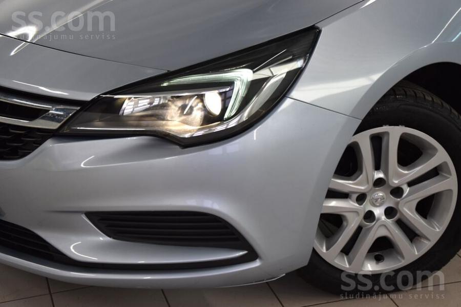 Blue Opel Astra 2019 in Riga, with an engine capacity of 1.40 L and mileage of 129 thousand km for 12990 €, photo 11 on AUTOMOTO.COM.LV