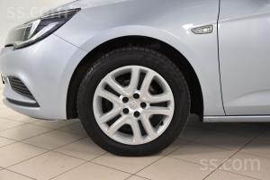 Blue Opel Astra 2019 in Riga, with an engine capacity of 1.40 L and mileage of 129 thousand km for 12990 €, photo 12 on AUTOMOTO.COM.LV