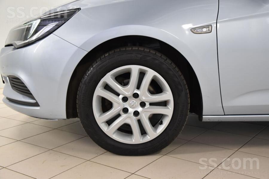 Blue Opel Astra 2019 in Riga, with an engine capacity of 1.40 L and mileage of 129 thousand km for 12990 €, photo 12 on AUTOMOTO.COM.LV