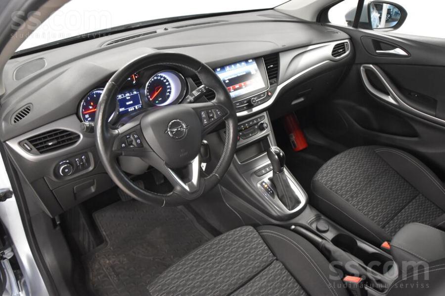 Blue Opel Astra 2019 in Riga, with an engine capacity of 1.40 L and mileage of 129 thousand km for 12990 €, photo 13 on AUTOMOTO.COM.LV