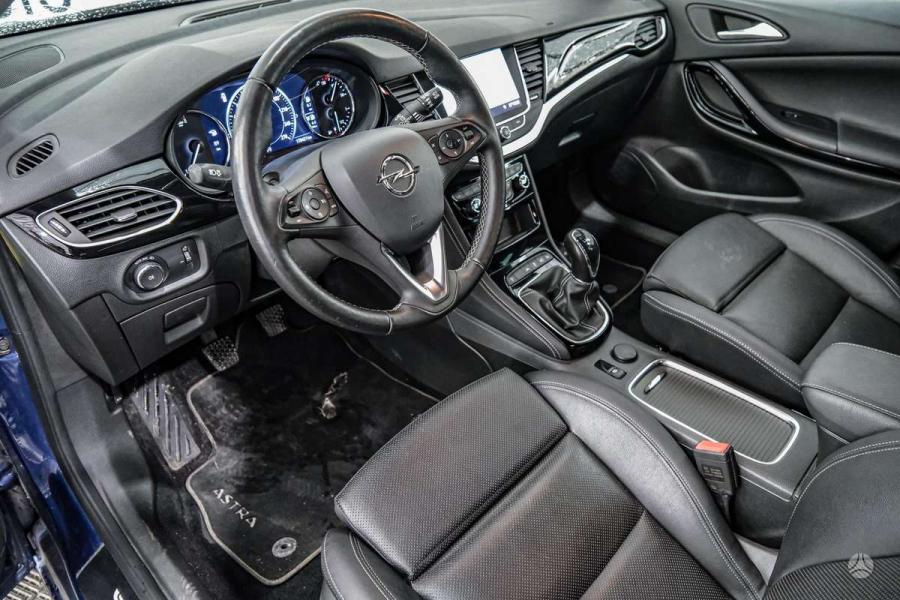 Blue Opel Astra 2020 in Kaunas, with an engine capacity of 1.20 L and mileage of 178 thousand km for 8290 €, photo 6 on AUTOMOTO.COM.LV