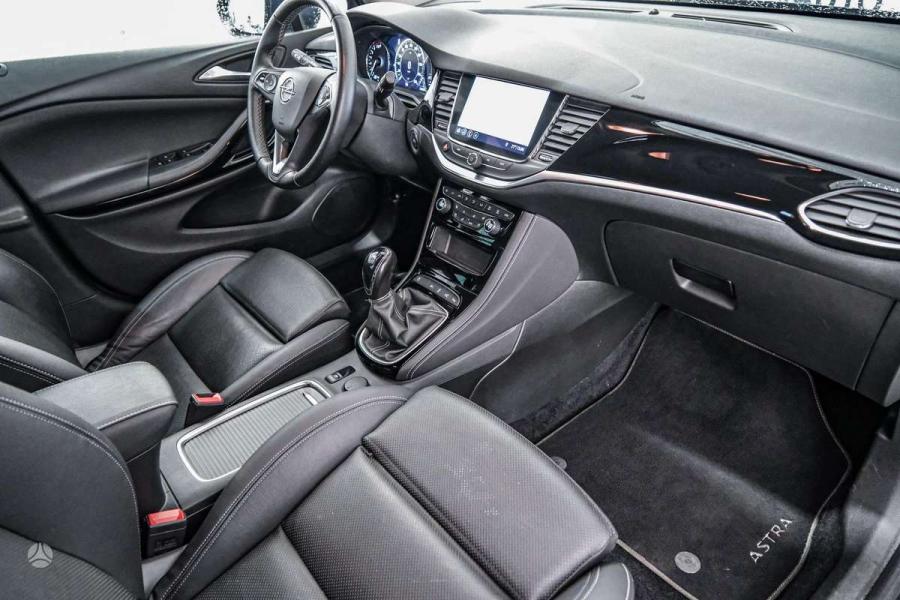 Blue Opel Astra 2020 in Kaunas, with an engine capacity of 1.20 L and mileage of 178 thousand km for 8290 €, photo 12 on AUTOMOTO.COM.LV