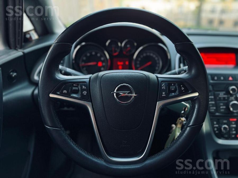 Brown Opel Astra 2014 in Cesis, with an engine capacity of 1.40 L and mileage of 0 thousand km for 2990 €, photo 19 on AUTOMOTO.COM.LV