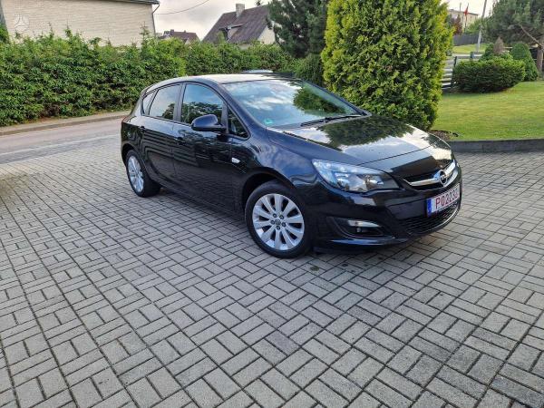 Brown Opel Astra 2014 in Kelme, with an engine capacity of 1.36 L and mileage of 157 thousand km for 5490 €, photo 1 on AUTOMOTO.COM.LV