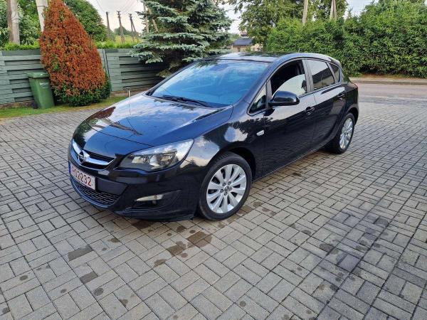 Brown Opel Astra 2014 in Kelme, with an engine capacity of 1.36 L and mileage of 157 thousand km for 5490 €, photo 2 on AUTOMOTO.COM.LV