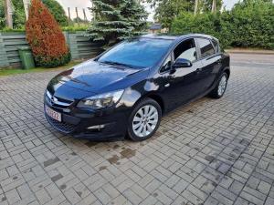 Brown Opel Astra 2014 in Kelme, with an engine capacity of 1.36 L and mileage of 157 thousand km for 5490 €, photo 3 on AUTOMOTO.COM.LV
