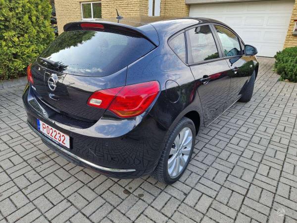 Brown Opel Astra 2014 in Kelme, with an engine capacity of 1.36 L and mileage of 157 thousand km for 5490 €, photo 5 on AUTOMOTO.COM.LV