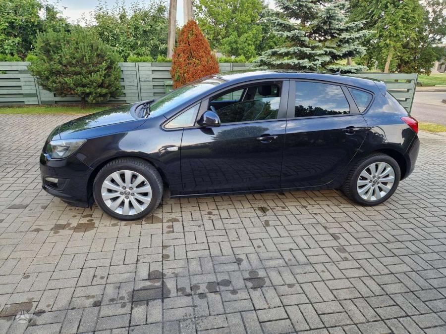 Brown Opel Astra 2014 in Kelme, with an engine capacity of 1.36 L and mileage of 157 thousand km for 5490 €, photo 7 on AUTOMOTO.COM.LV