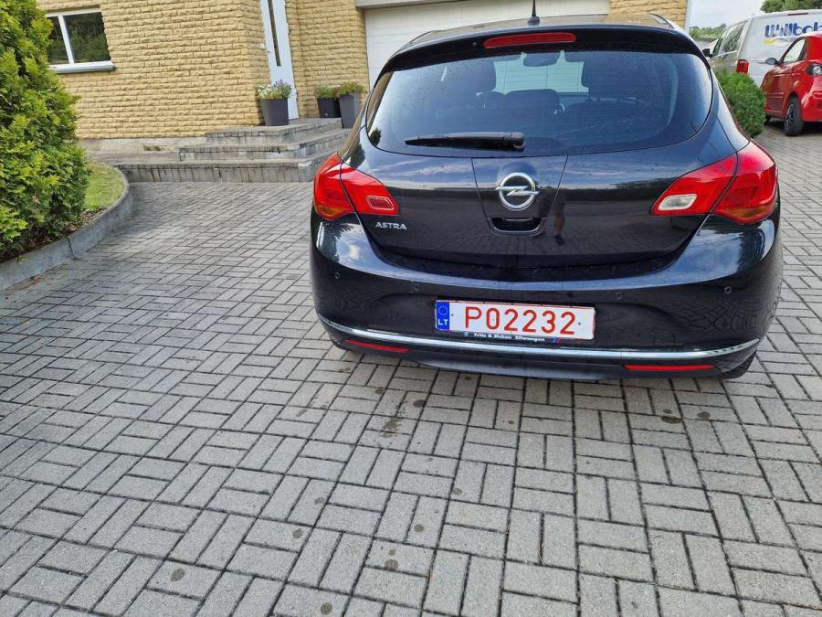 Brown Opel Astra 2014 in Kelme, with an engine capacity of 1.36 L and mileage of 157 thousand km for 5490 €, photo 8 on AUTOMOTO.COM.LV