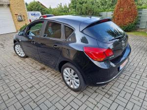 Brown Opel Astra 2014 in Kelme, with an engine capacity of 1.36 L and mileage of 157 thousand km for 5490 €, photo 9 on AUTOMOTO.COM.LV