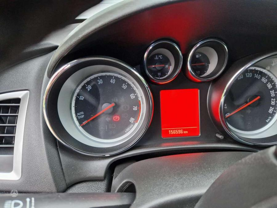 Brown Opel Astra 2014 in Kelme, with an engine capacity of 1.36 L and mileage of 157 thousand km for 5490 €, photo 10 on AUTOMOTO.COM.LV