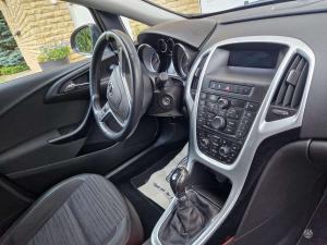 Brown Opel Astra 2014 in Kelme, with an engine capacity of 1.36 L and mileage of 157 thousand km for 5490 €, photo 13 on AUTOMOTO.COM.LV
