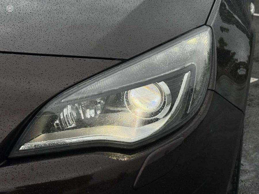Brown Opel Astra 2014 in Kaunas, with an engine capacity of 1.96 L and mileage of 280 thousand km for 4650 €, photo 14 on AUTOMOTO.COM.LV