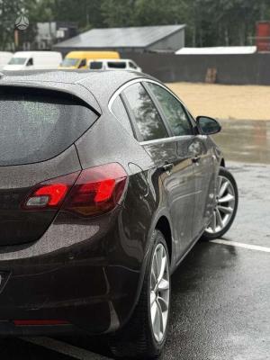 Brown Opel Astra 2014 in Kaunas, with an engine capacity of 1.96 L and mileage of 280 thousand km for 4650 €, photo 34 on AUTOMOTO.COM.LV