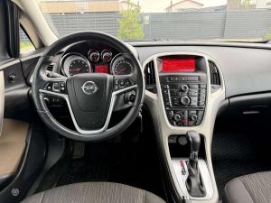 Brown Opel Astra 2015 in Vilnius, with an engine capacity of 1.36 L and mileage of 150 thousand km for 4850 €, photo 14 on AUTOMOTO.COM.LV