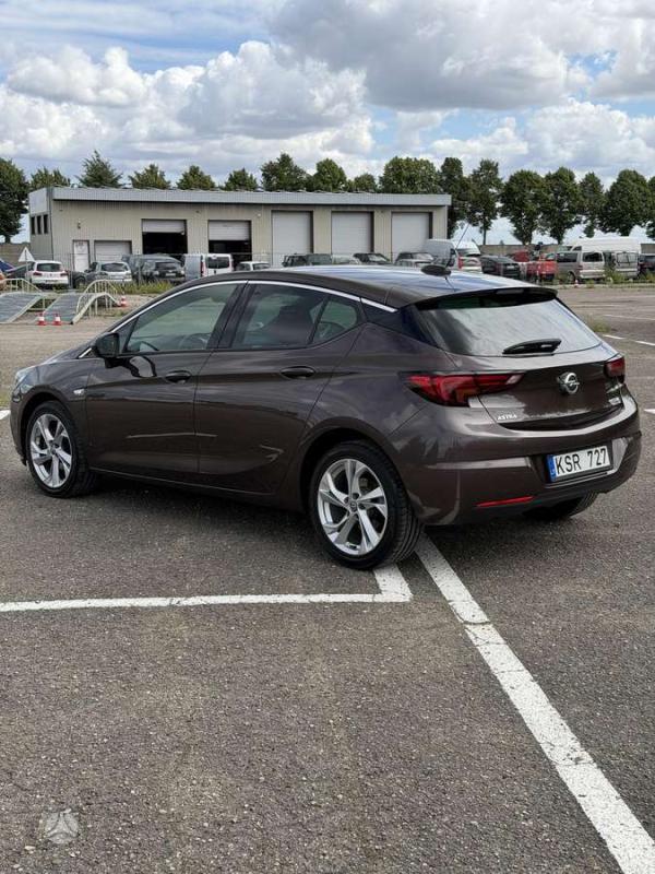 Brown Opel Astra 2016 in Kedainiai, with an engine capacity of 1.00 L and mileage of 112 thousand km for 6900 €, photo 4 on AUTOMOTO.COM.LV