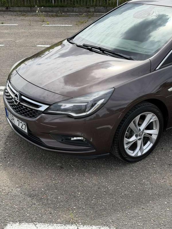 Brown Opel Astra 2016 in Kedainiai, with an engine capacity of 1.00 L and mileage of 112 thousand km for 6900 €, photo 7 on AUTOMOTO.COM.LV