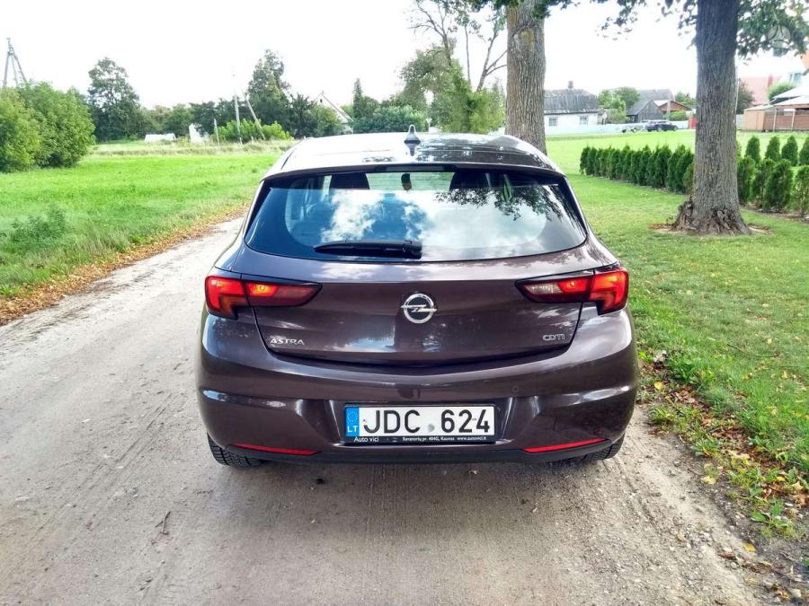 Brown Opel Astra 2016 in Vilkaviskis, with an engine capacity of 1.60 L and mileage of 246 thousand km for 4950 €, photo 4 on AUTOMOTO.COM.LV