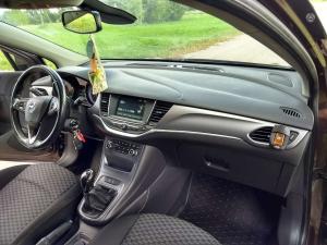 Brown Opel Astra 2016 in Vilkaviskis, with an engine capacity of 1.60 L and mileage of 246 thousand km for 4950 €, photo 13 on AUTOMOTO.COM.LV