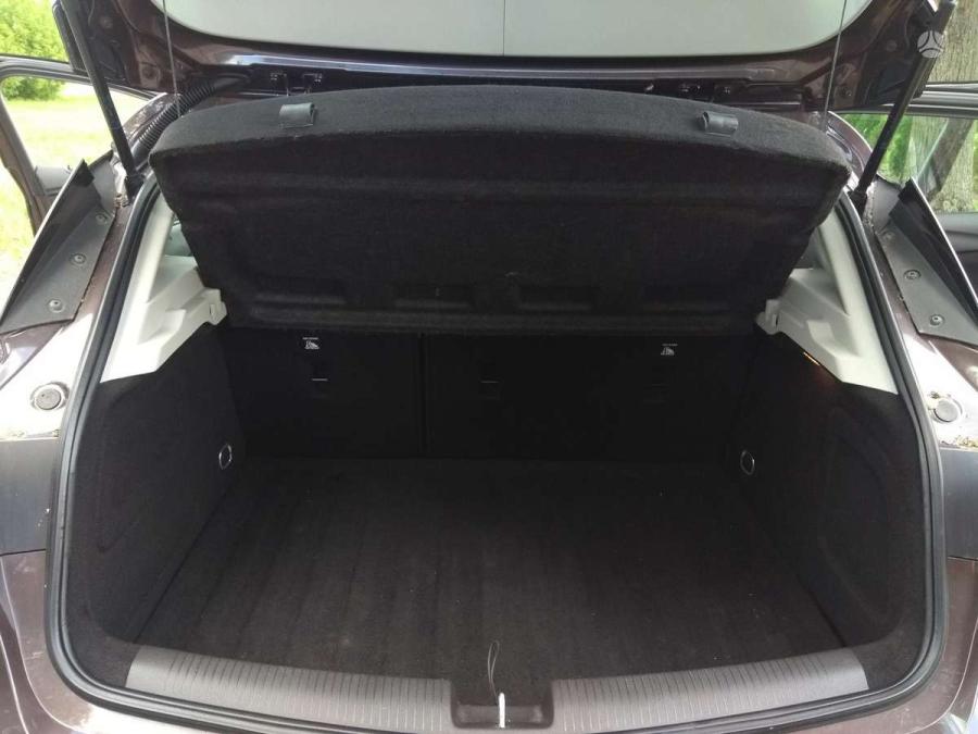 Brown Opel Astra 2016 in Vilkaviskis, with an engine capacity of 1.60 L and mileage of 246 thousand km for 4950 €, photo 21 on AUTOMOTO.COM.LV