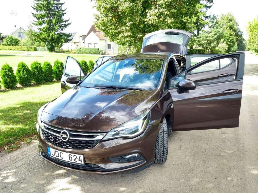 Brown Opel Astra 2016 in Vilkaviskis, with an engine capacity of 1.60 L and mileage of 246 thousand km for 4950 €, photo 26 on AUTOMOTO.COM.LV