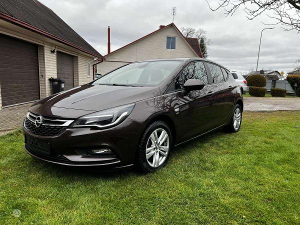 Brown Opel Astra 2018 in Ukmerge, with an engine capacity of 1.40 L and mileage of 128 thousand km for 6950 €, photo 2 on AUTOMOTO.COM.LV