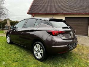 Brown Opel Astra 2018 in Ukmerge, with an engine capacity of 1.40 L and mileage of 128 thousand km for 6950 €, photo 3 on AUTOMOTO.COM.LV