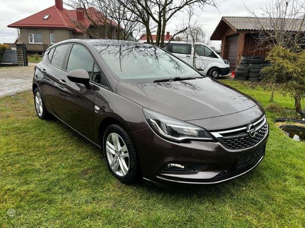 Brown Opel Astra 2018 in Ukmerge, with an engine capacity of 1.40 L and mileage of 128 thousand km for 6950 €, photo 6 on AUTOMOTO.COM.LV