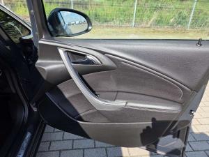 Brown Opel Astra 2013 in Marijampole, with an engine capacity of 1.36 L and mileage of 200 thousand km for 4300 €, photo 12 on AUTOMOTO.COM.LV