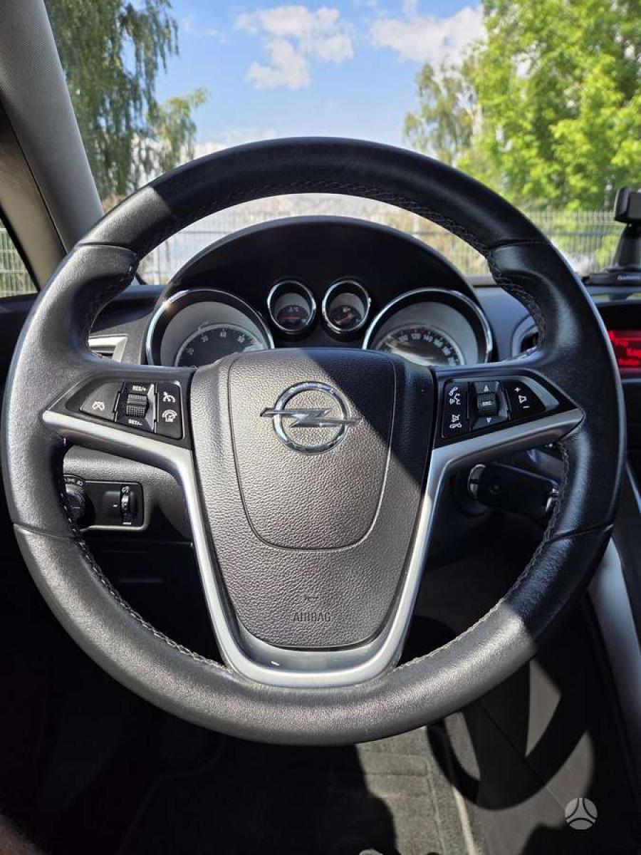 Brown Opel Astra 2013 in Marijampole, with an engine capacity of 1.36 L and mileage of 200 thousand km for 4300 €, photo 21 on AUTOMOTO.COM.LV