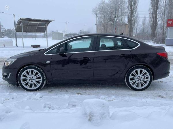 Brown Opel Astra 2014 in Taurage, with an engine capacity of 1.60 L and mileage of 282 thousand km for 4350 €, photo 2 on AUTOMOTO.COM.LV